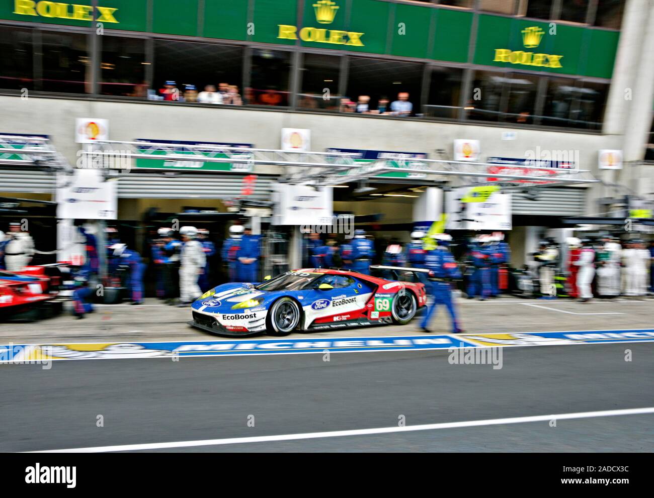 Pit stop at 24 Hours of Le Mans, 2016. Ford GT racing car leaving a pit ...