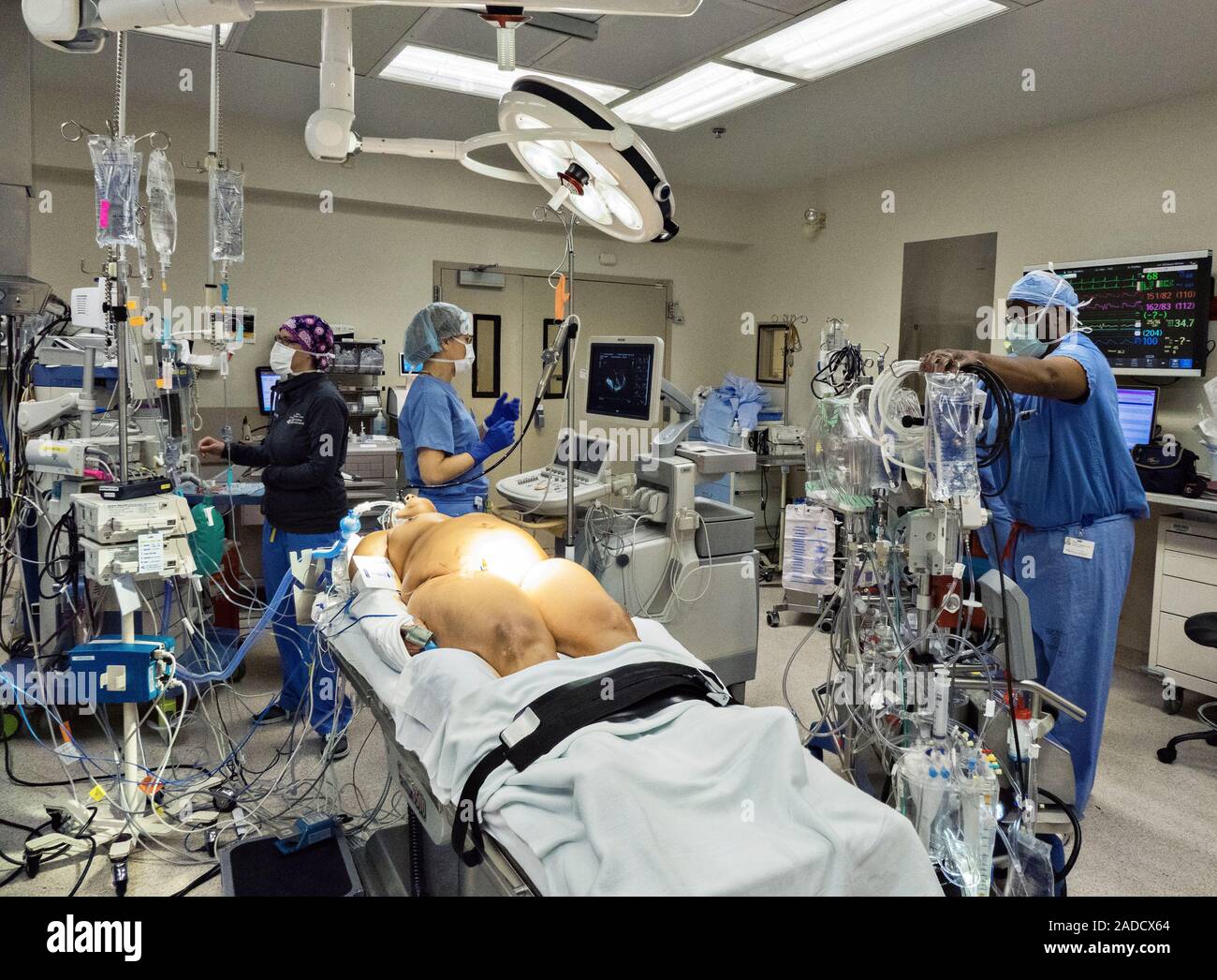 Open heart surgery preparations. Surgical team preparing for open heart ...