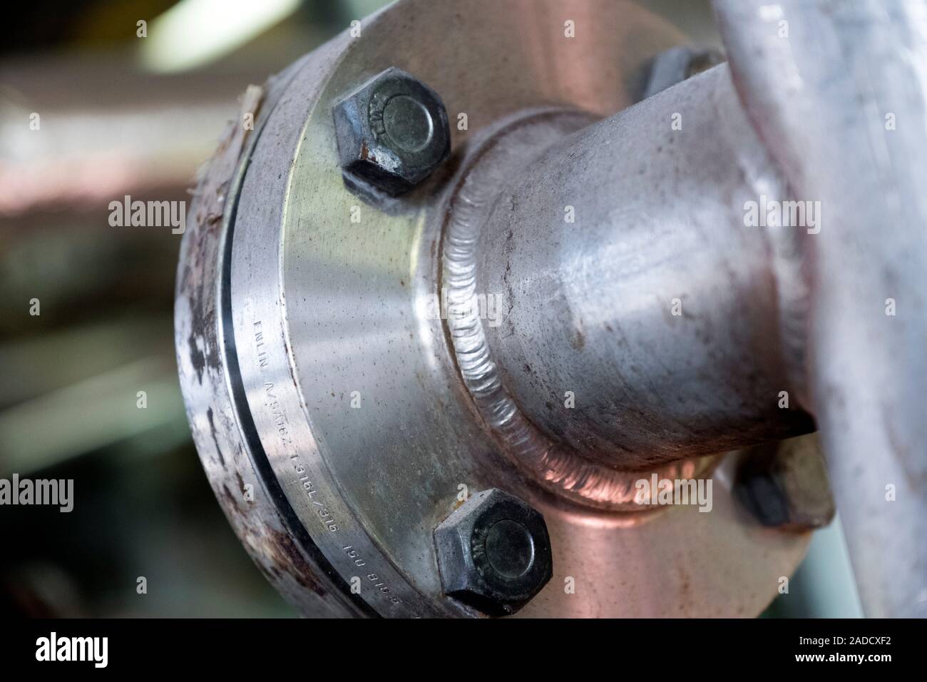 CalaChem chemical factory. Heavy duty connection on a chemical pipe at ...
