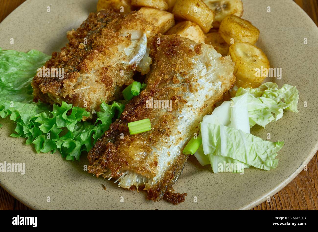 Ngolo, fried fish with bananas, Congolese cuisine, Traditional assorted ...