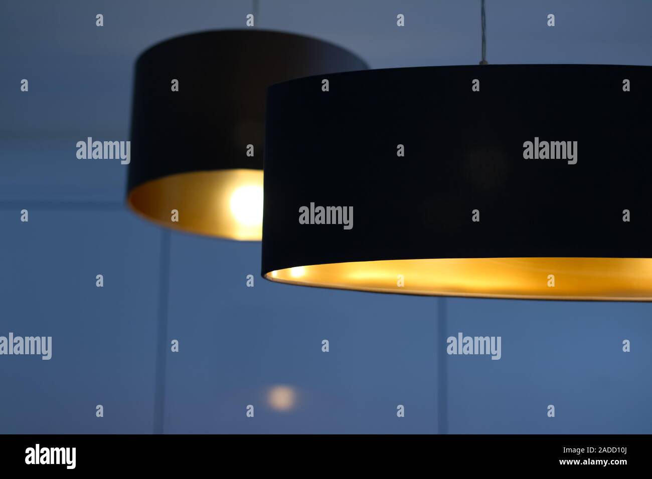 Interior design, indoor lamps and electricity concept - Golden lamp in ...