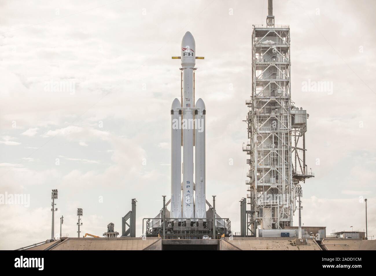 Falcon Heavy launch preparation. Falcon Heavy rocket on its launchpad ...