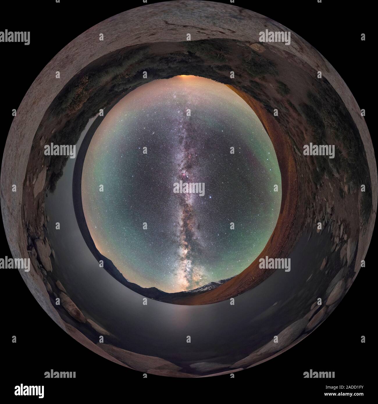 Milky Way over lake. Fisheye view of the Milky Way in the night sky ...