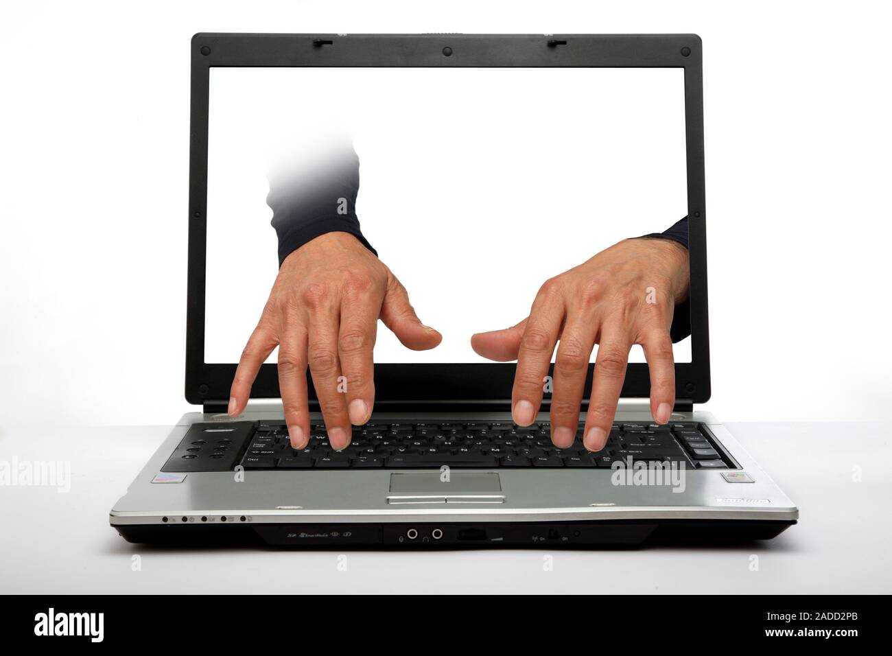 Computer hacking. Conceptual image of a hands typing on a computer ...