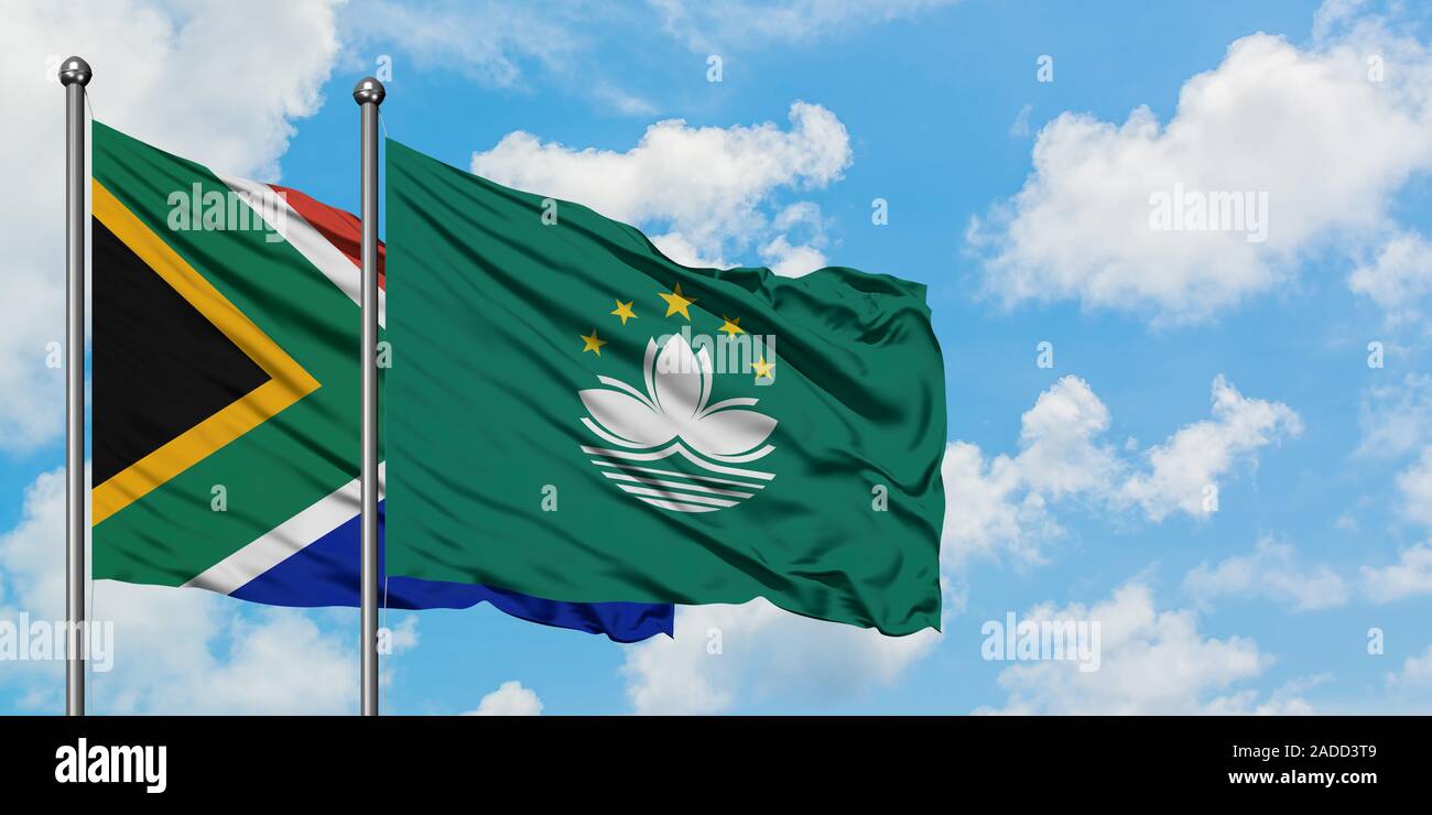 South Africa and Macao flag waving in the wind against white cloudy ...