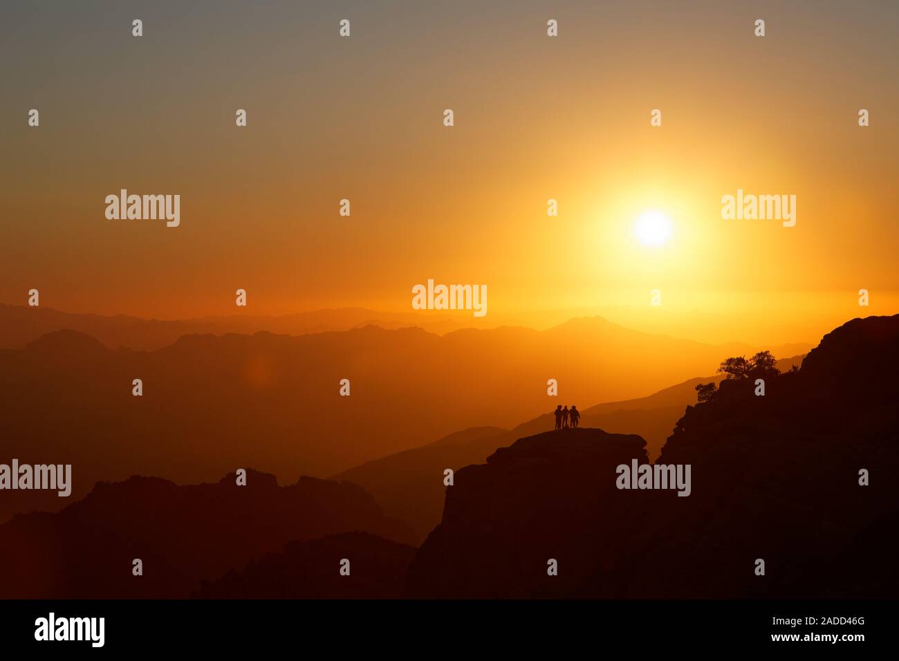 Beautiful sunset over Tucson, AZ - Sun is above the horizon. People in ...