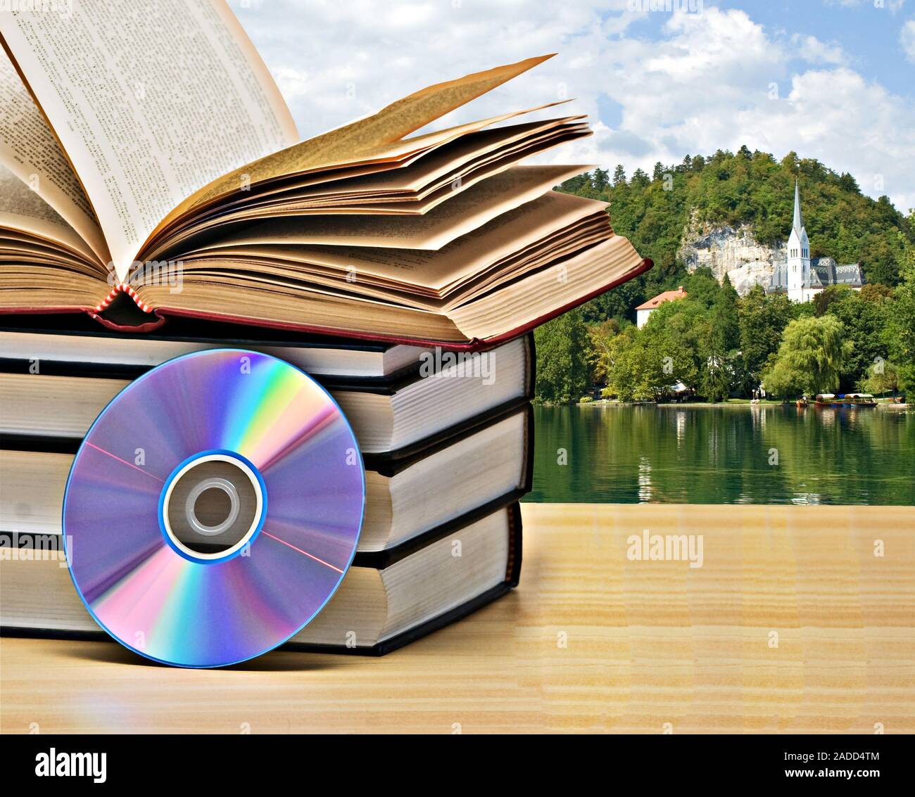 Books and dvd on desk Stock Photo - Alamy