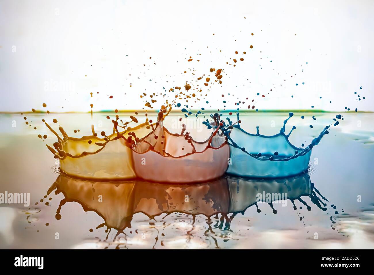 Water drop impact. High-speed photograph of secondary drop formation ...