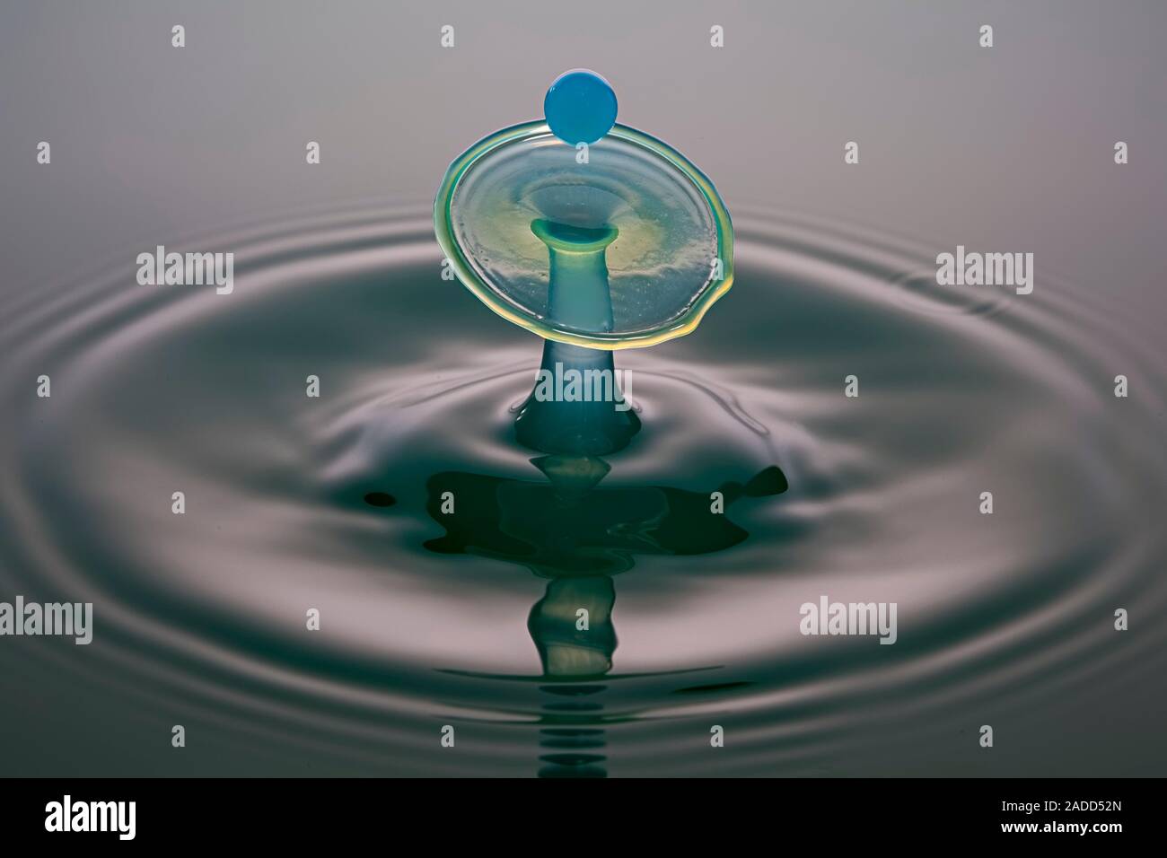 Water drop impact. High-speed photograph of secondary drop formation ...