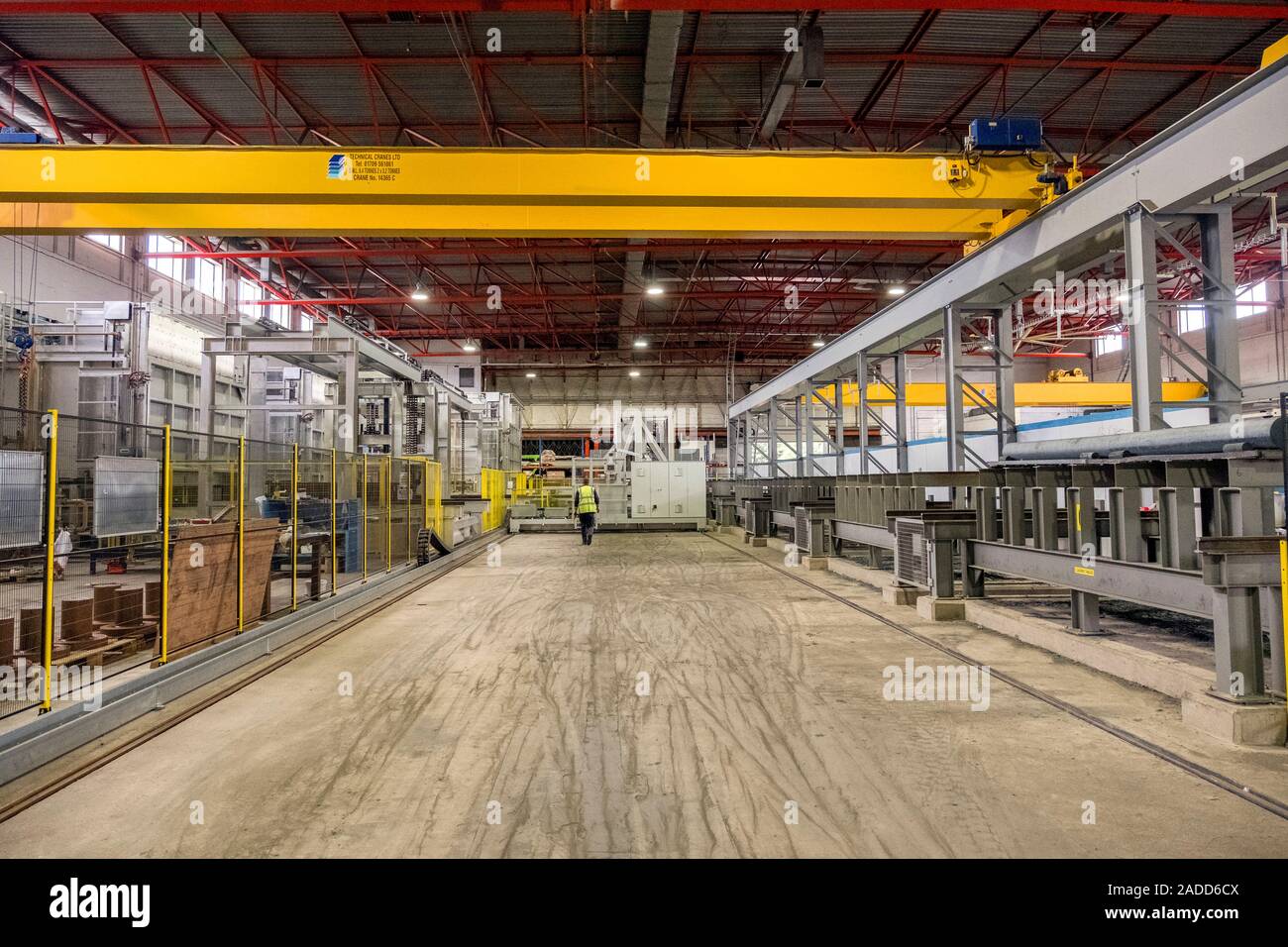 Metalworks. Interior of a metalworks, showing the robot pallet lifting ...