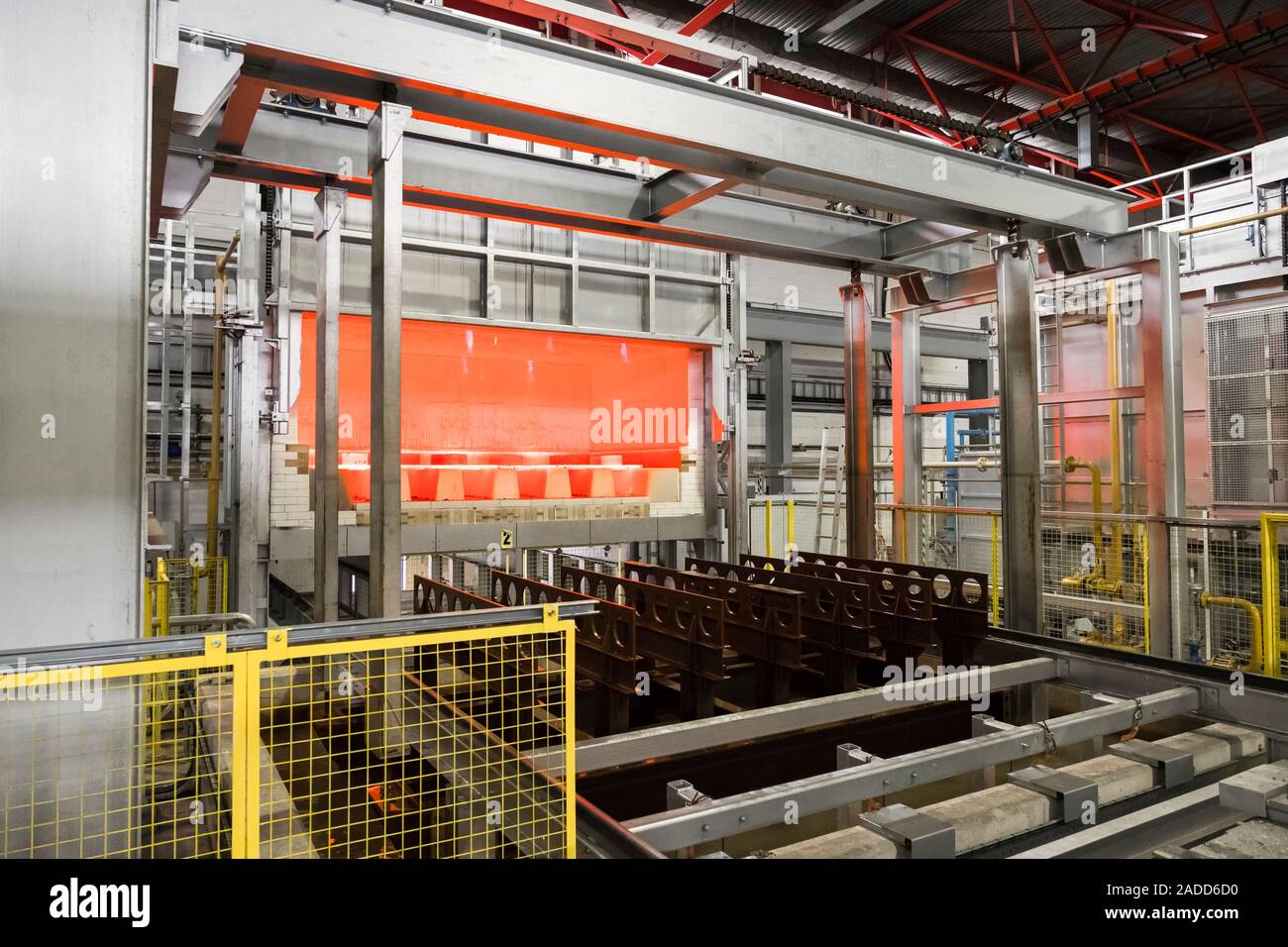 Metalworks. Batch furnaces and water quench tank at a metalworks. These ...