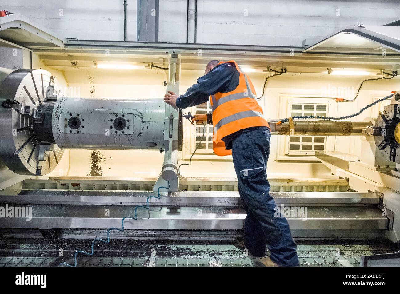 Metalworks. Precision engineered steel parts being made at a metalworks ...