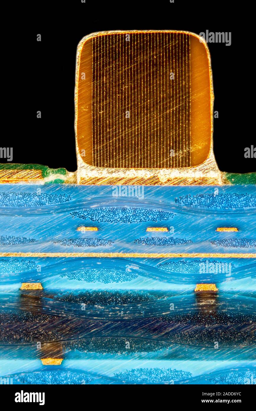 Light micrograph of a section through a computer printed circuit board ...