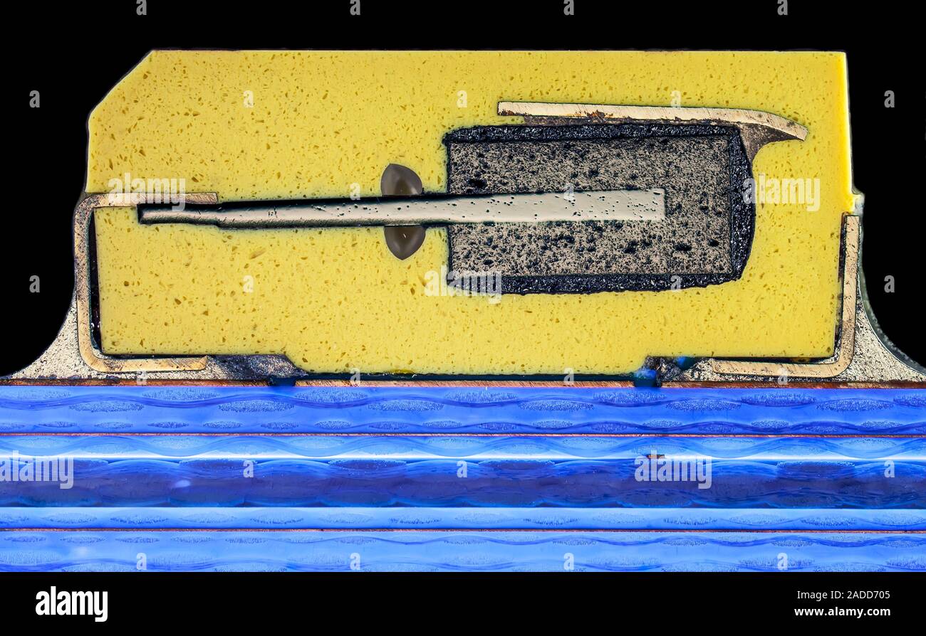 Light micrograph of a section through a computer printed circuit board ...