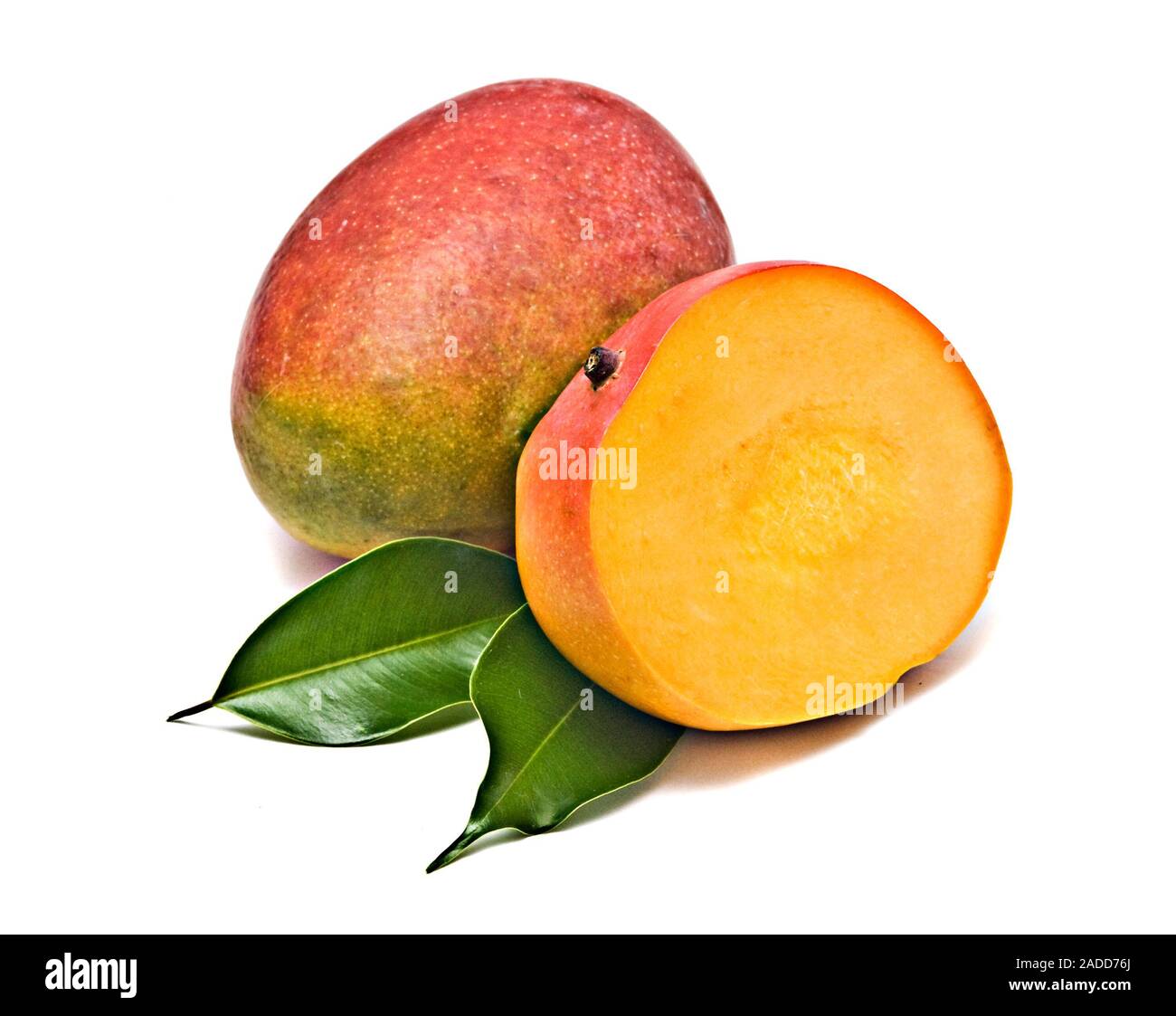 Mango sections isolated on white background Stock Photo - Alamy