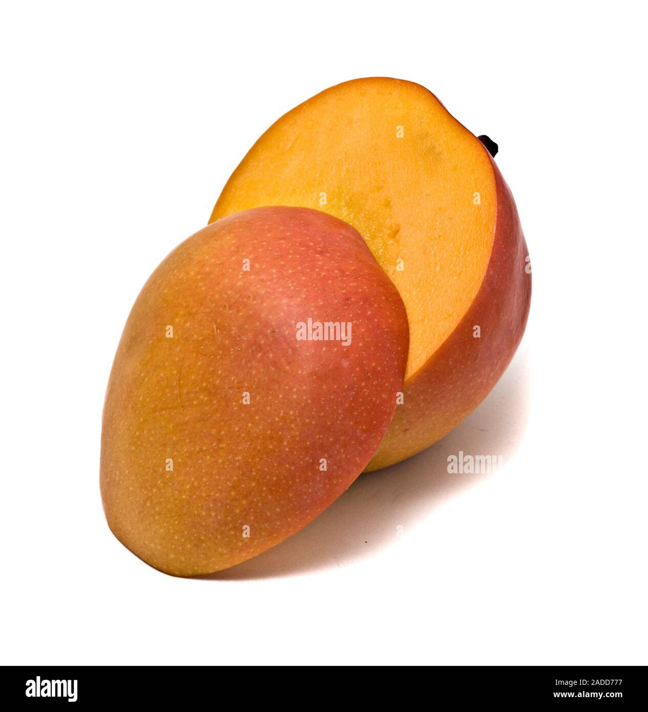 Mango sections isolated on white background Stock Photo - Alamy