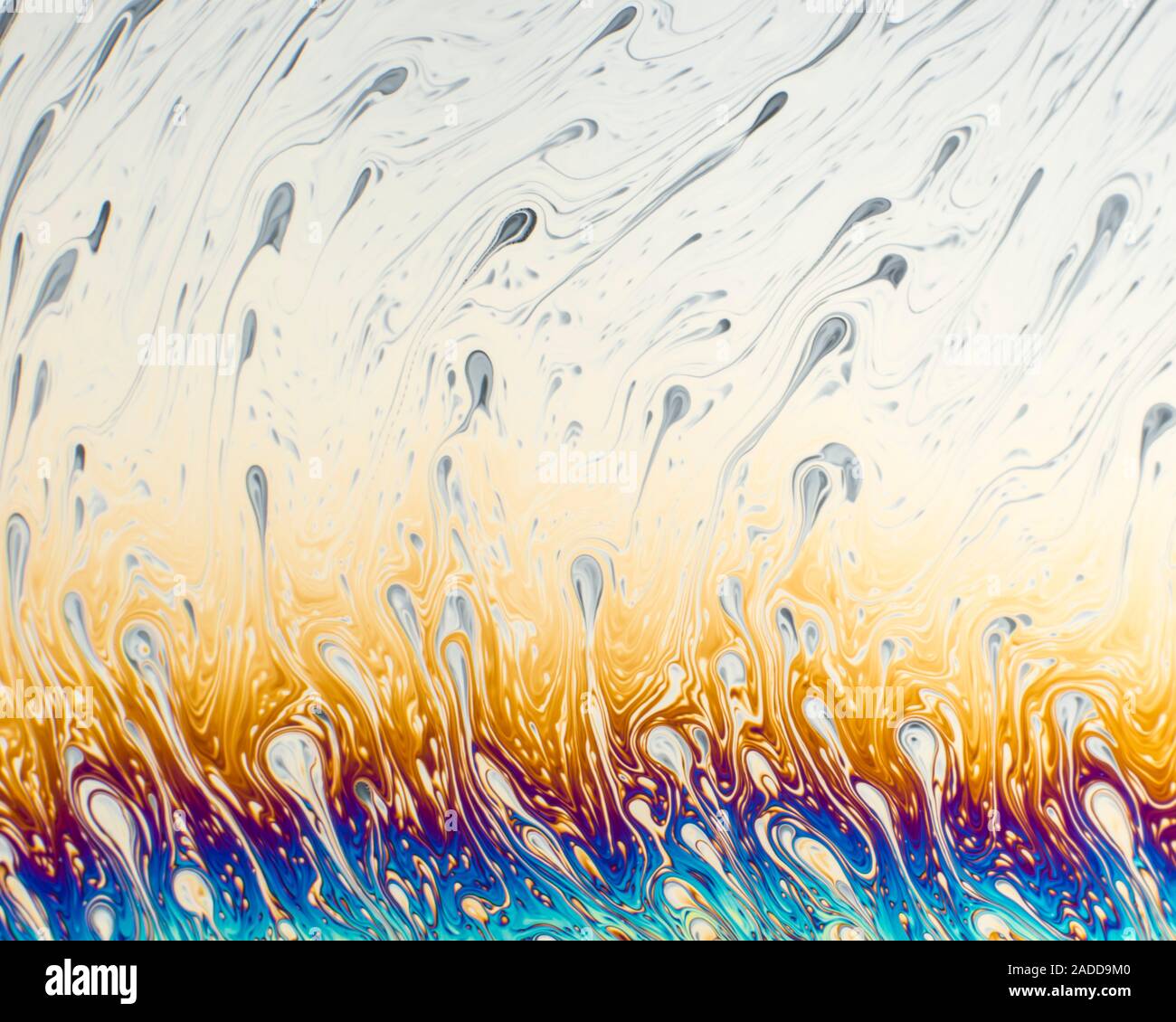Close-up of the surface of a bubble of soap showing light interference ...