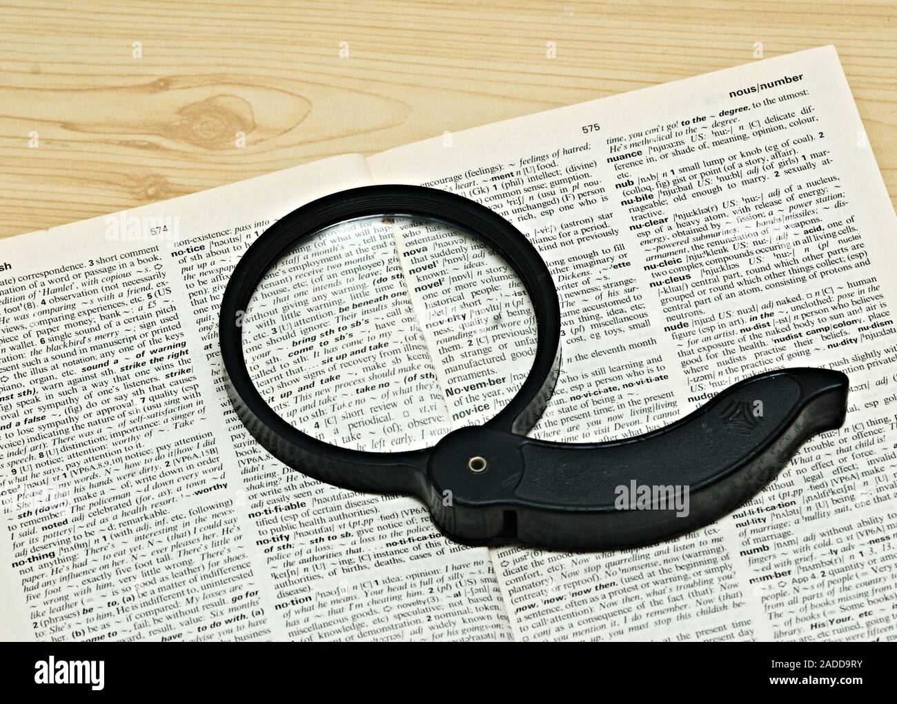 Magnifying glass dictionary close up hi-res stock photography and ...