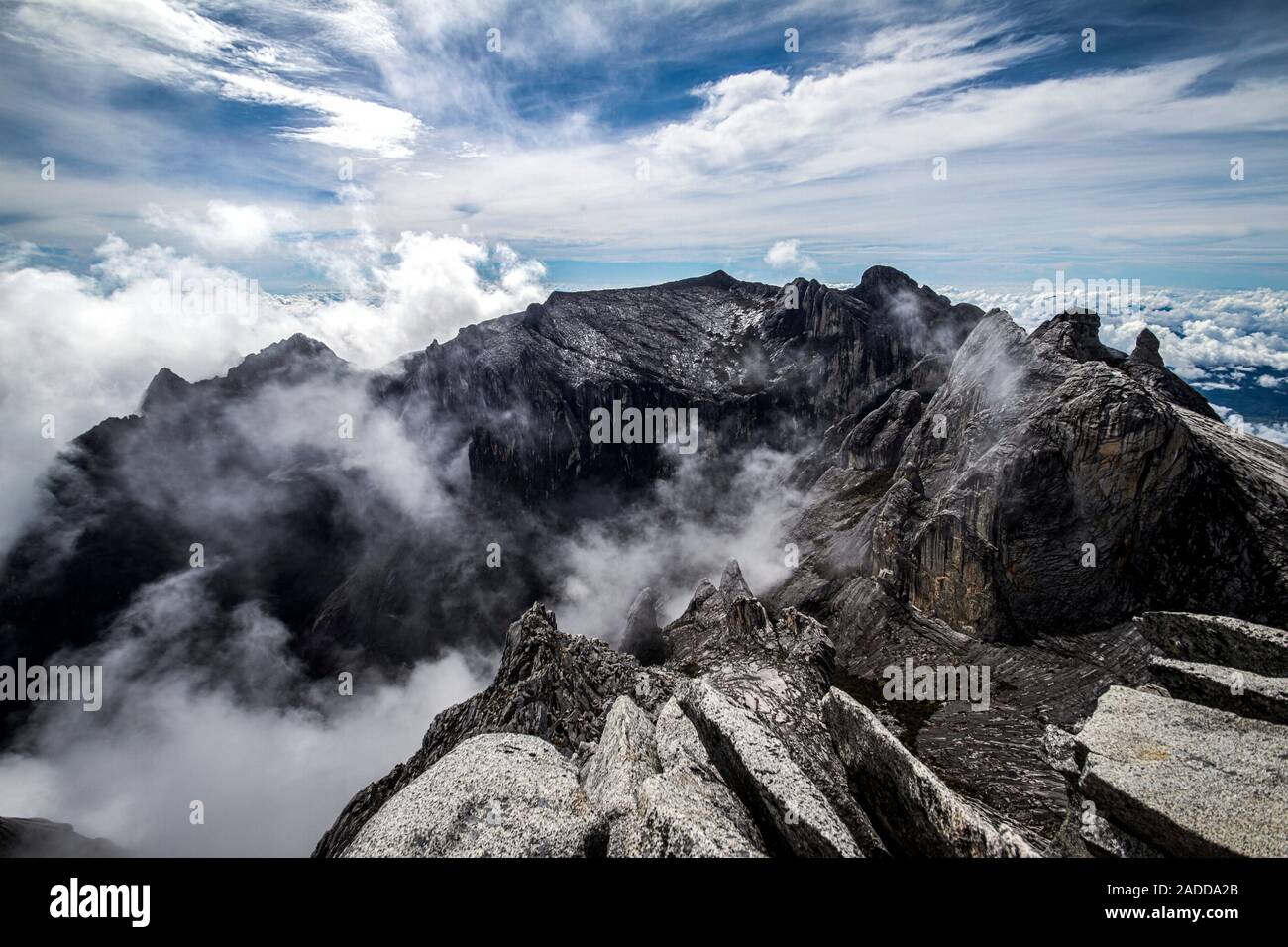 Mount Kinabalu. Clouds over Low's Gully as seen from the summit of ...