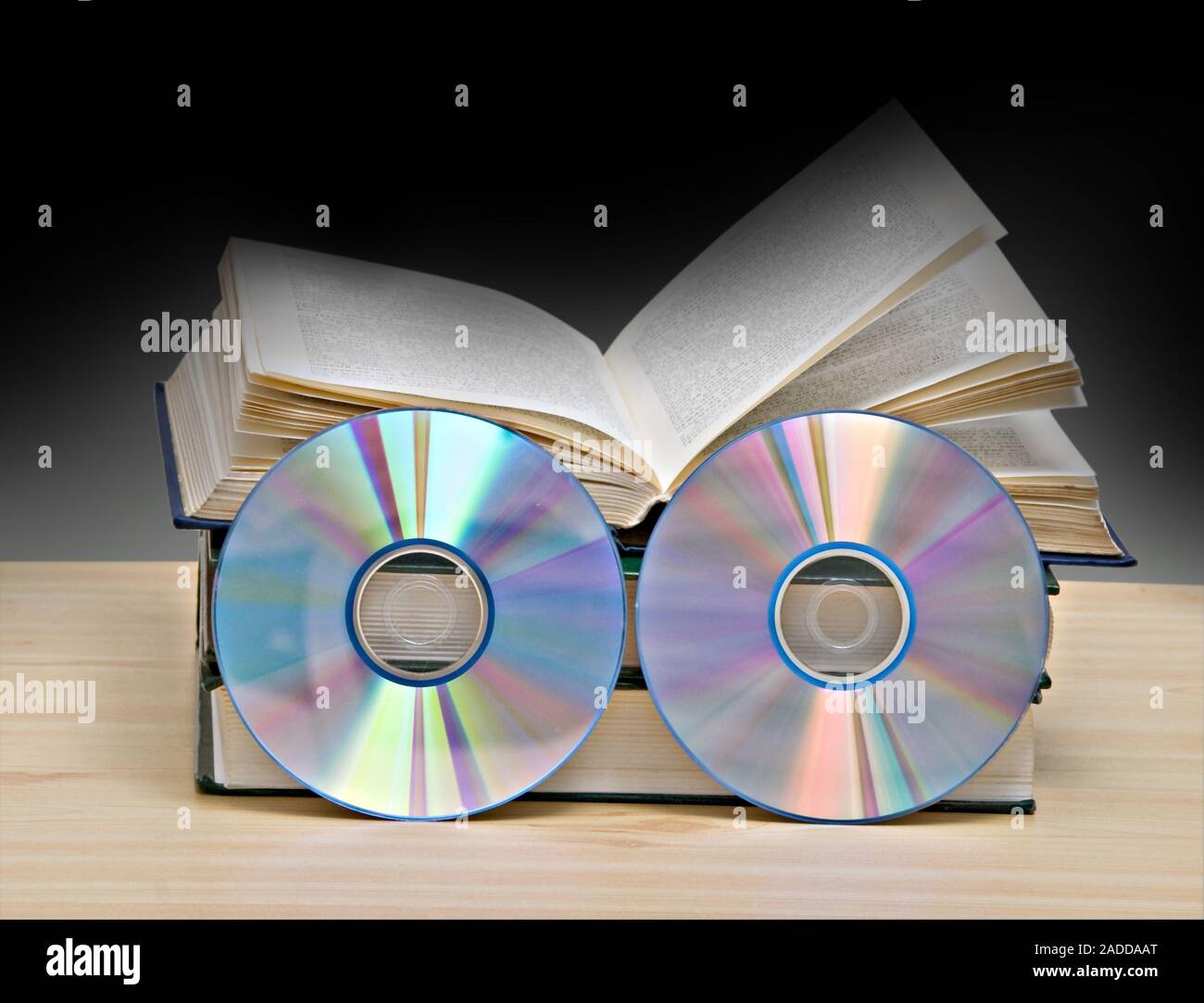 books and DVD as symbols of old and new methods of information storage ...