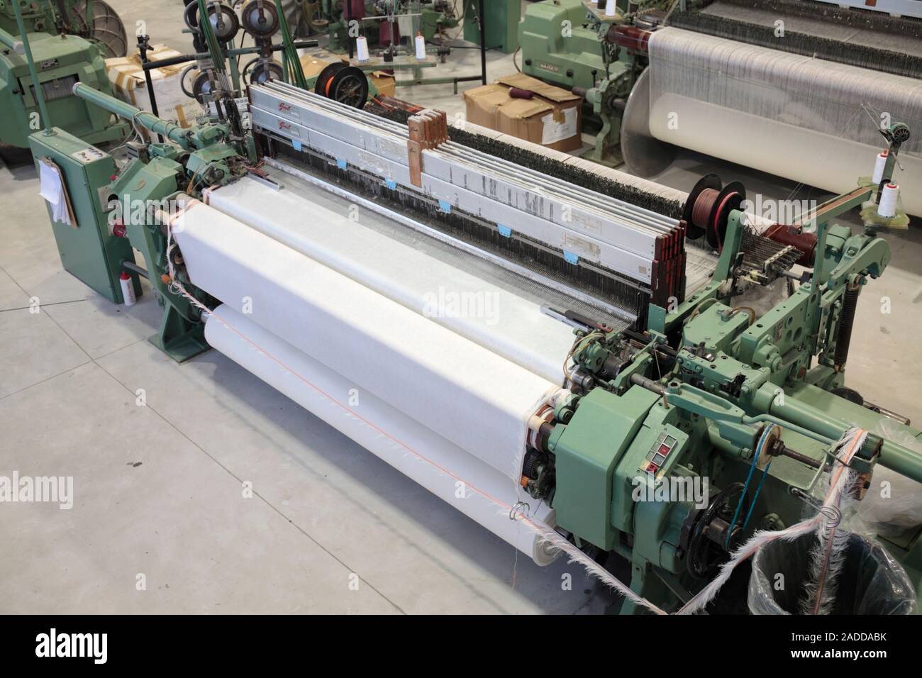 Textile mill. Dornier looms in use in a textile mill. This loom dates ...