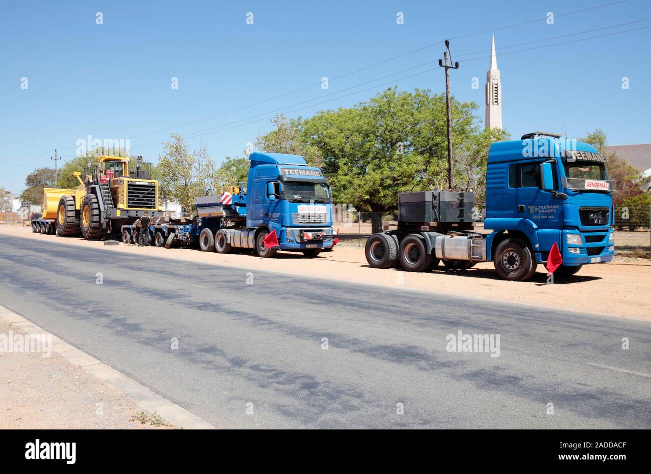Mining vehicle transport. Mining vehicle being transported to a heavy ...