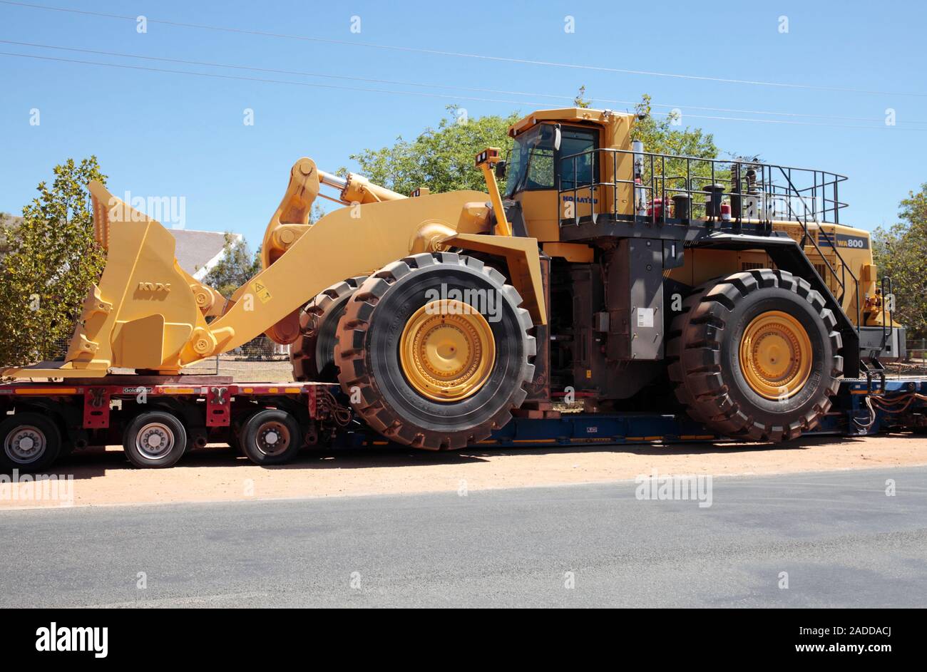 Mining vehicle transport. Mining vehicle being transported to a heavy ...
