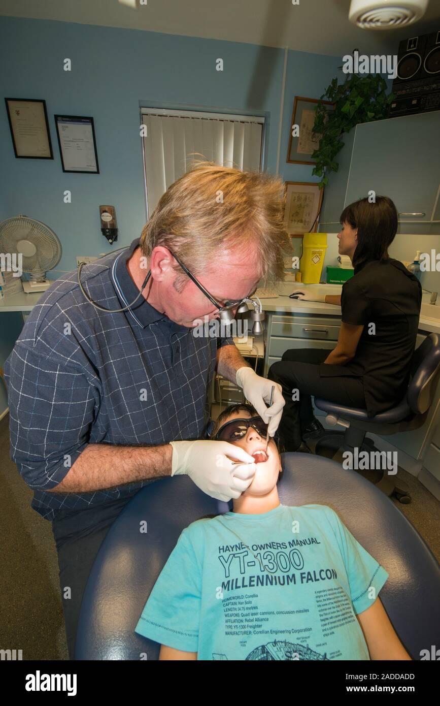 Boy, aged 8, having dental check-up, Wales, UK Stock Photo - Alamy