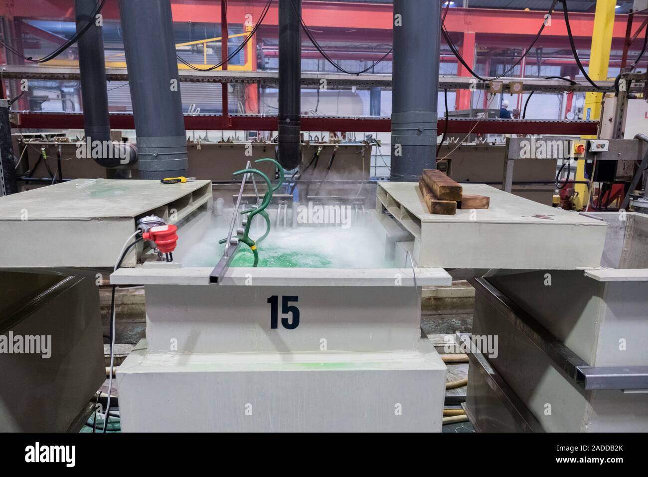 Electroless nickel plating factory. Nickel plating chemical tank at a ...