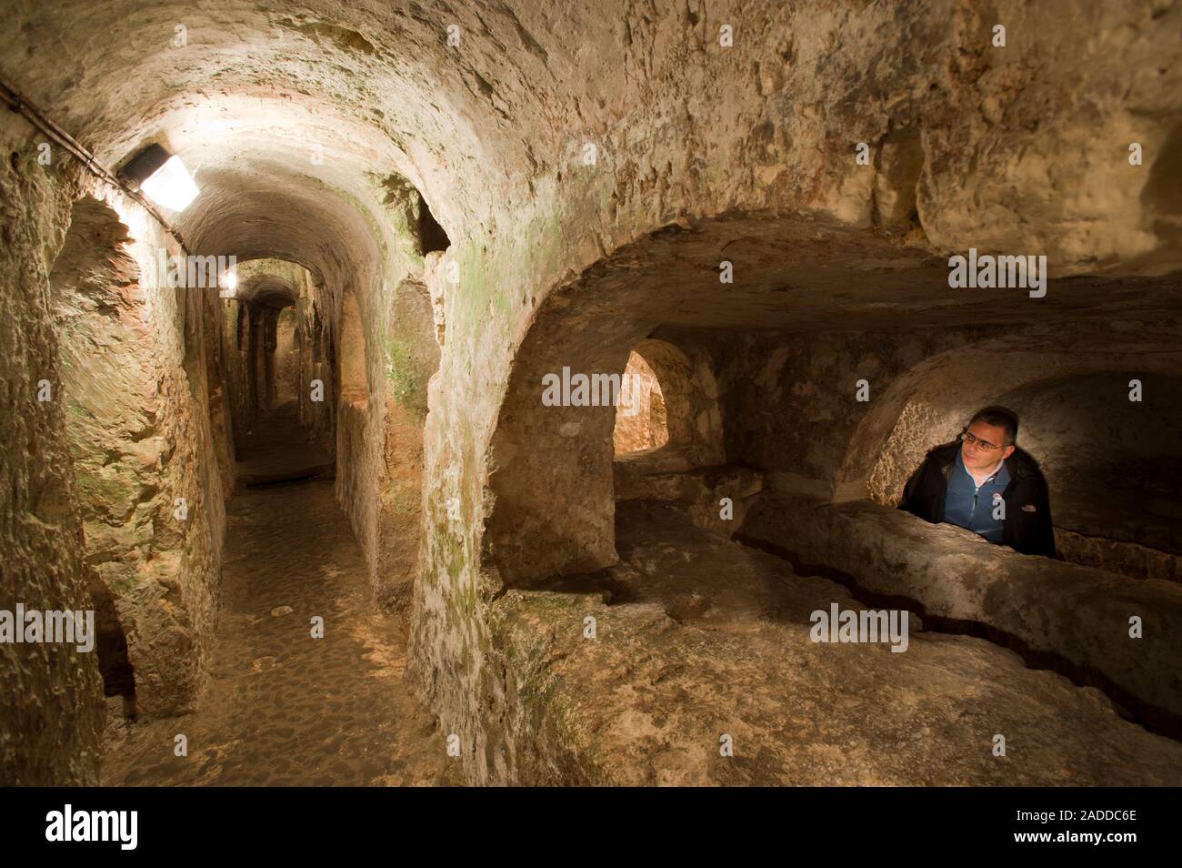 Saint Paul's Catacombs. Man inside Saint Paul's Catacombs, Mdina, Malta ...