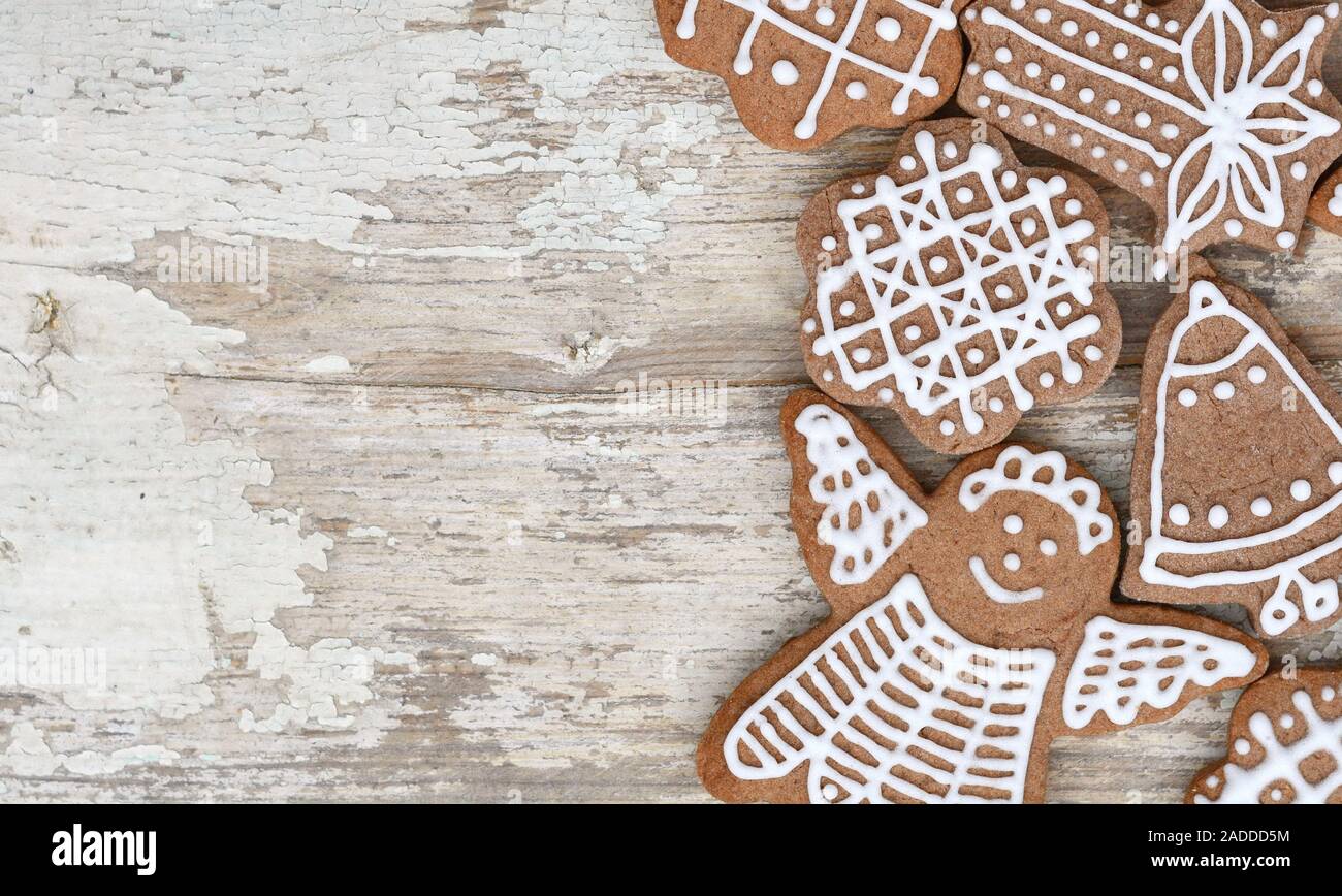 Domestic gingerbread of various forms on rustic wooden table Stock ...