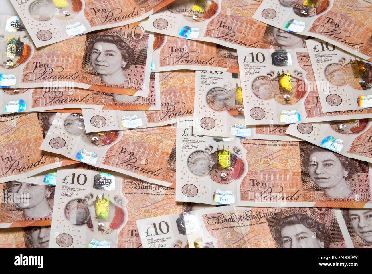 New ten pound notes. Pile of the new polymer (plastic) 10 pound notes ...