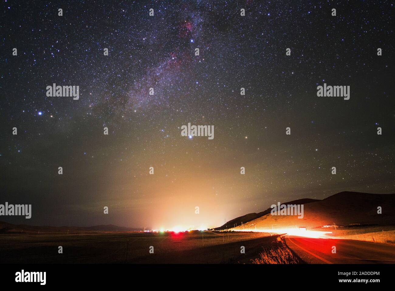 Milky Way and light pollution. Band of the Milky Way (upper left) and ...
