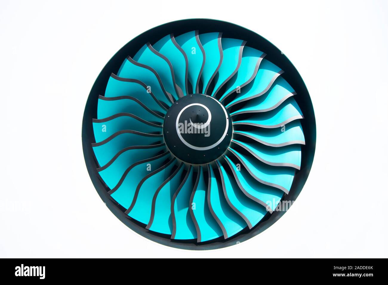 An aircraft engine fan mounted in the white wall of the Rolls Royce ...