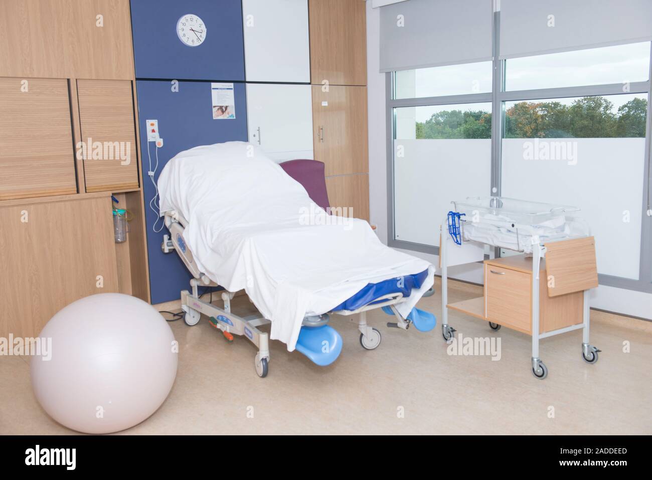 Maternity ward hospital bed with associated equipment. Photographed in ...