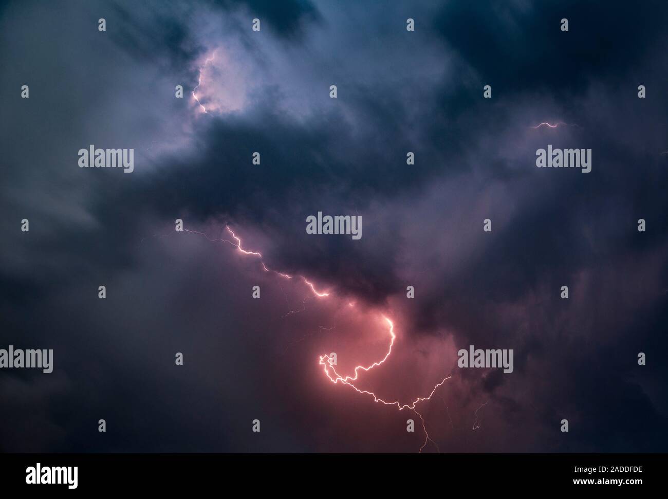 Lightning, time-exposure image. Lightning occurs when a large ...