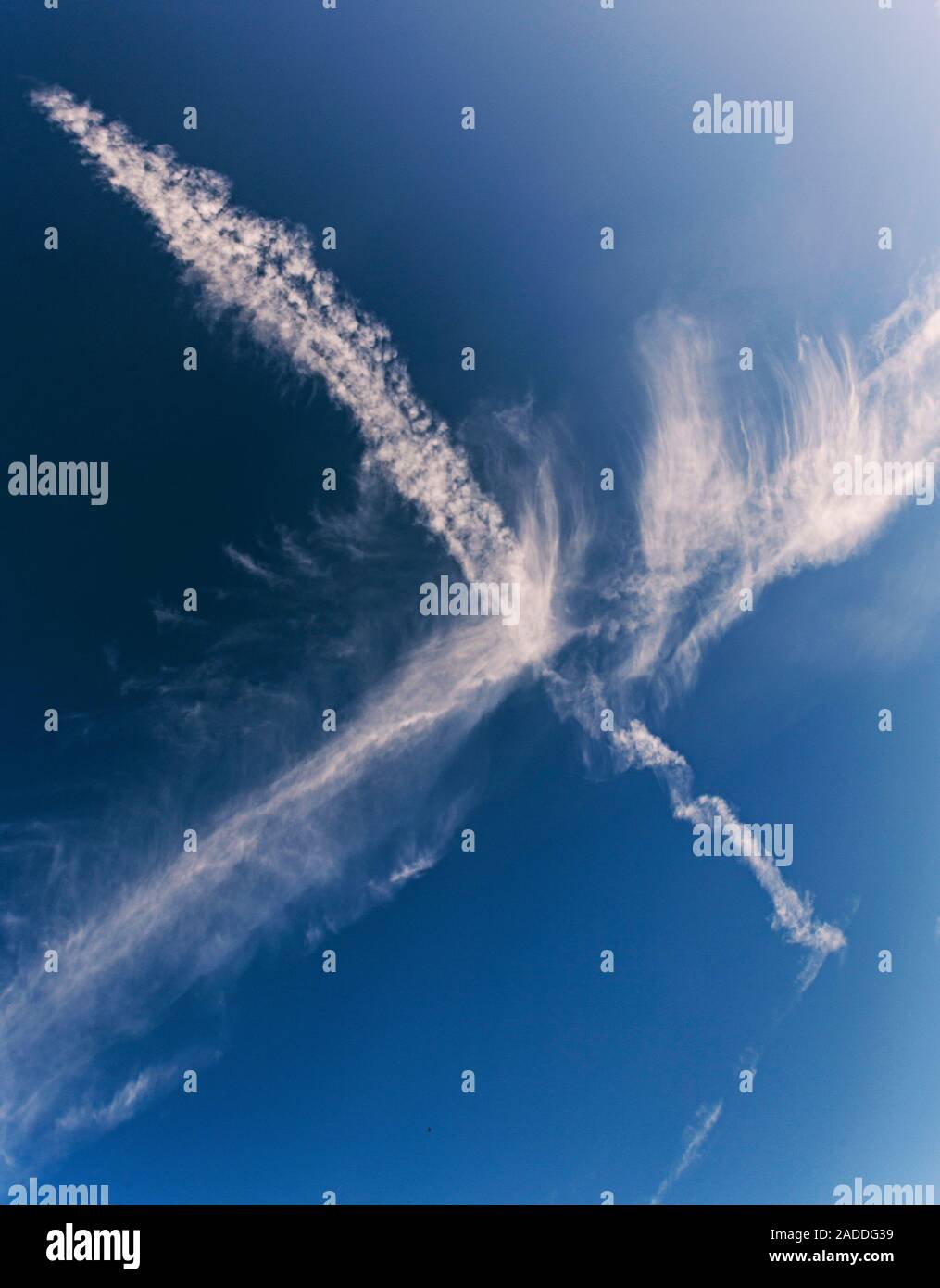 Aircraft contrails and cirrus clouds. Aircraft contrails (condensation ...