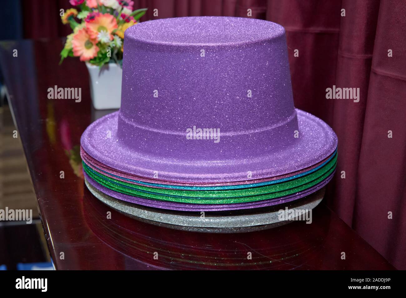 Colorfull magical hats. Pink metallic party hat . Purple magician ...