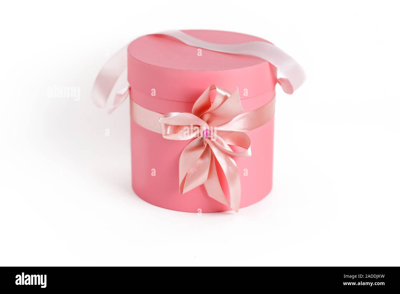 pink gift boxes in round shape isolated Stock Photo - Alamy