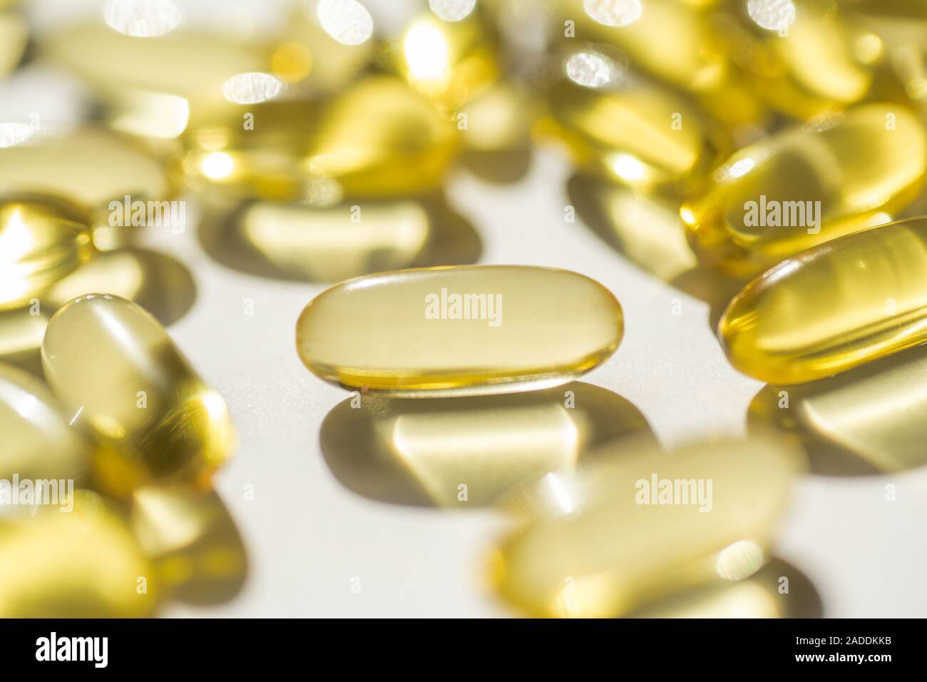 Close up capsules of fish fat oil , omega 3, vitamin Healthy food diet ...