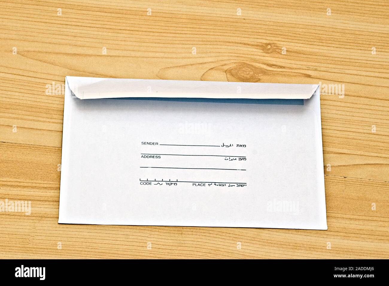 Envelope on desk Stock Photo - Alamy