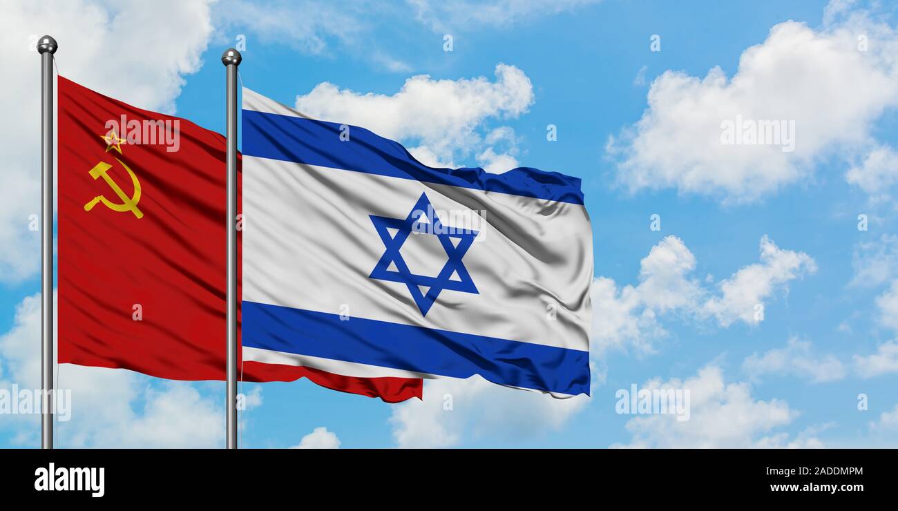 Soviet Union and Israel flag waving in the wind against white cloudy ...