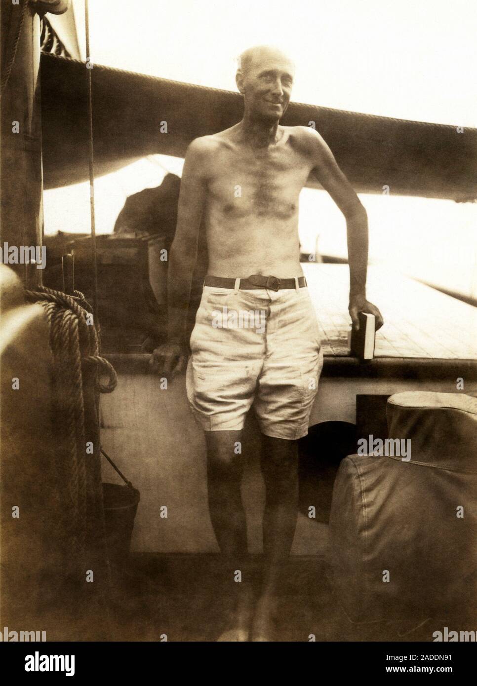 William Beebe aboard the Antares. US naturalist William Beebe (1877 ...