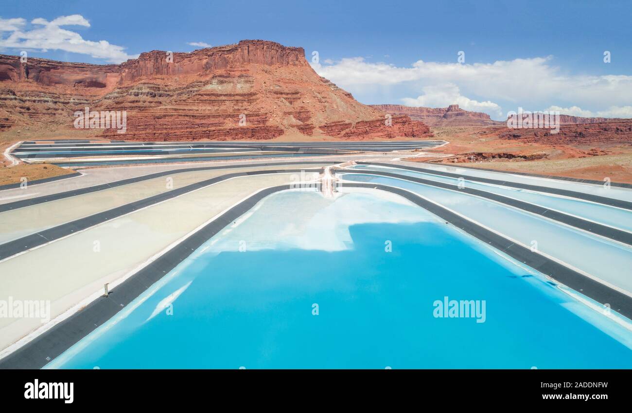 These bright blue evaporation ponds contain potassium chloride, a salt ...