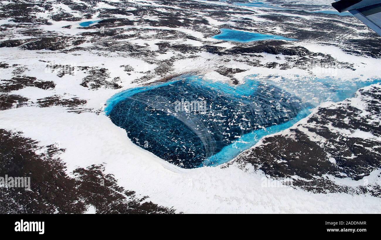 Frozen meltwater lake, Greenland. Photographed from NASA's P-3B ...