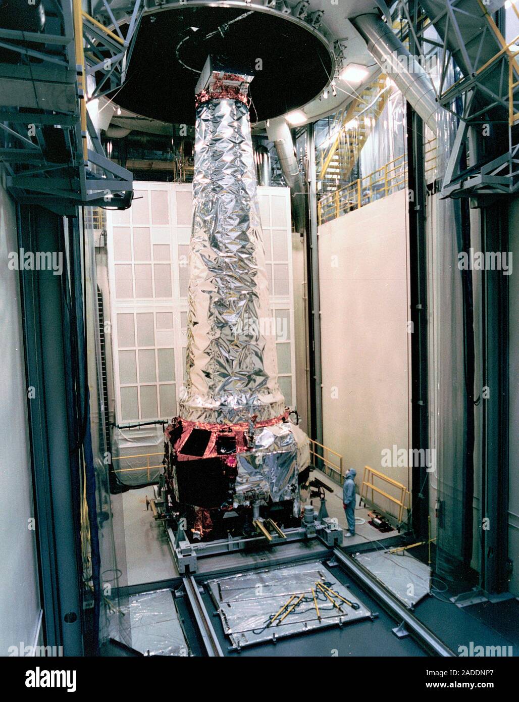 Chandra X-ray Observatory (CXO) after assembly. TRW technician ...