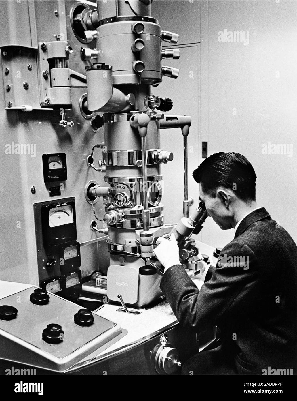 Transmission electron microscopy, 1960s. Researcher using a ...