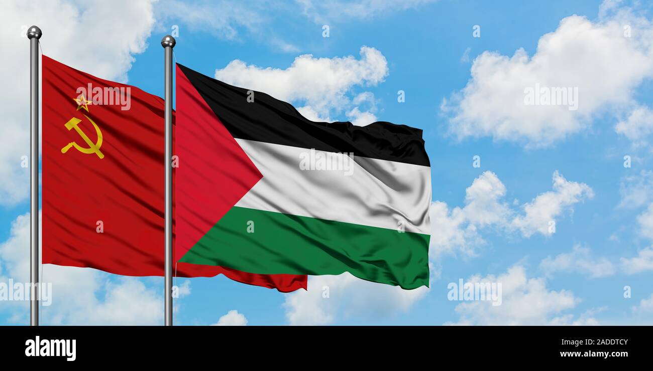 Soviet Union and Palestine flag waving in the wind against white cloudy ...