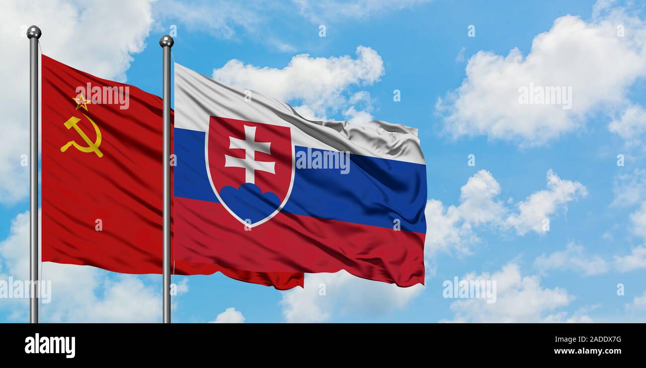 Soviet Union and Slovakia flag waving in the wind against white cloudy ...