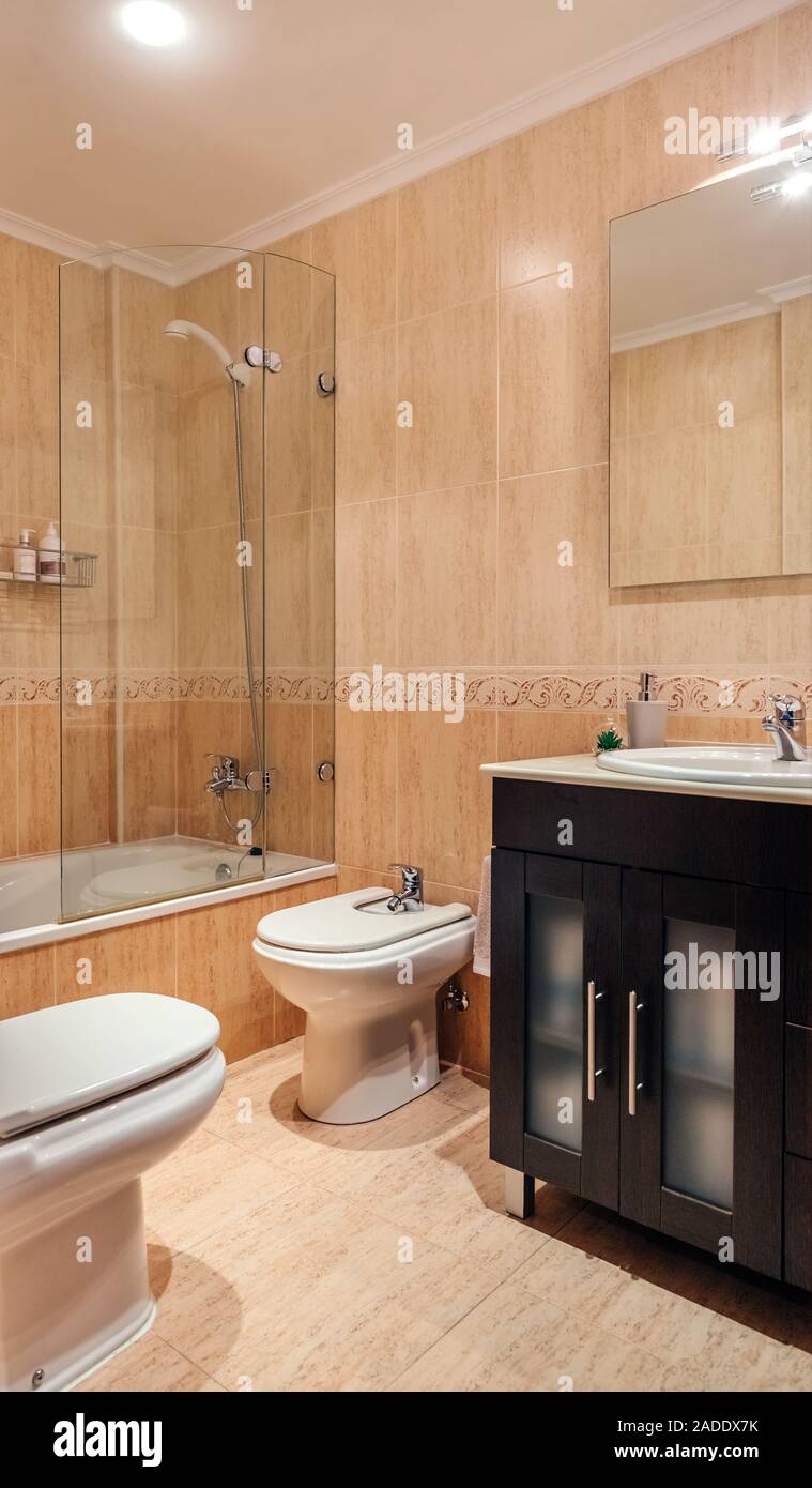Bathroom with mirror and shower screen Stock Photo - Alamy